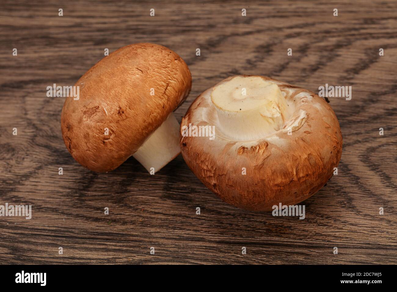 Tasty Raw Brown Champignons over background Stock Photo - Alamy
