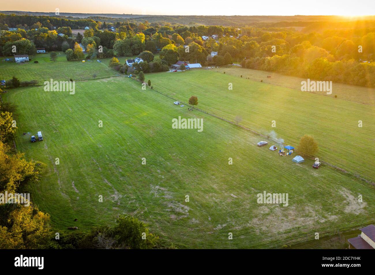 Hipcamp campers hanging out tent camping in farm fields on the weekend ...
