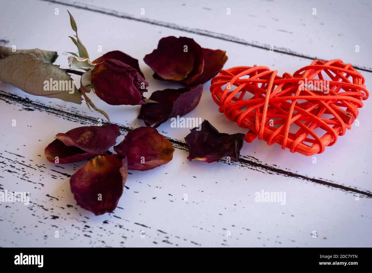 Valentines Day and Day of Love Ideas, Red Rattan Hearts and Dry Roses Stock Photo - Alamy