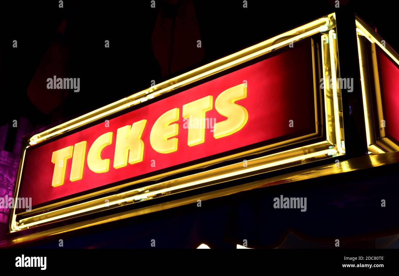 neon carnival amusement park ride lights at night Stock Photo - Alamy