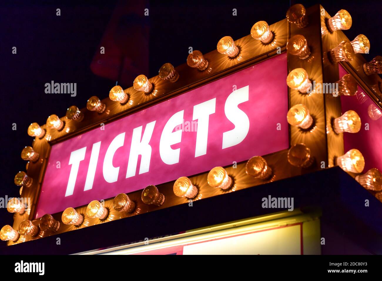 neon carnival amusement park ride lights at night Stock Photo - Alamy