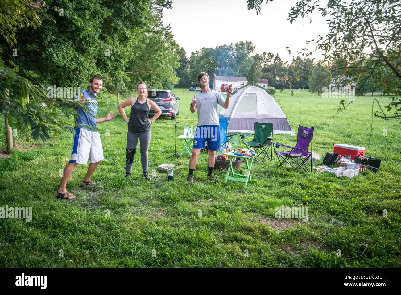 Hipcamp campers hanging out tent camping in farm fields on the weekend ...