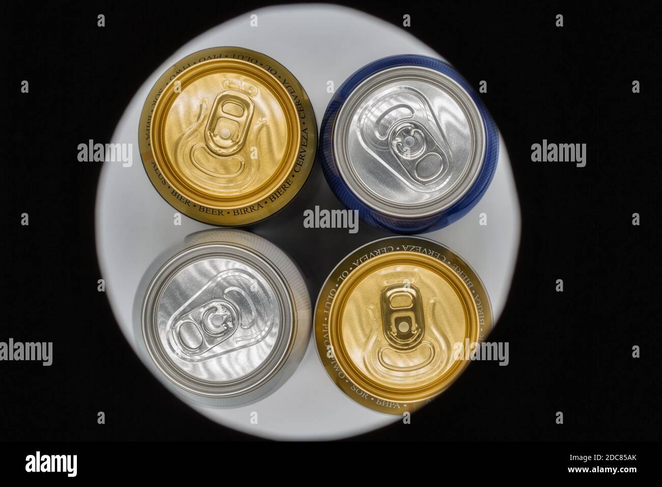 different closed beer drinking cans closeup view from above through ...