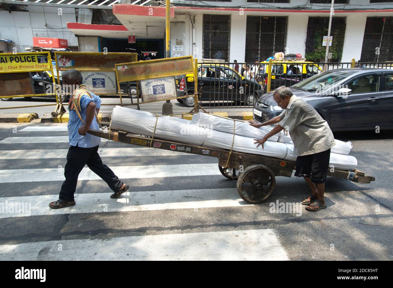 Pushing cart handcart barrow hi-res stock photography and images - Alamy