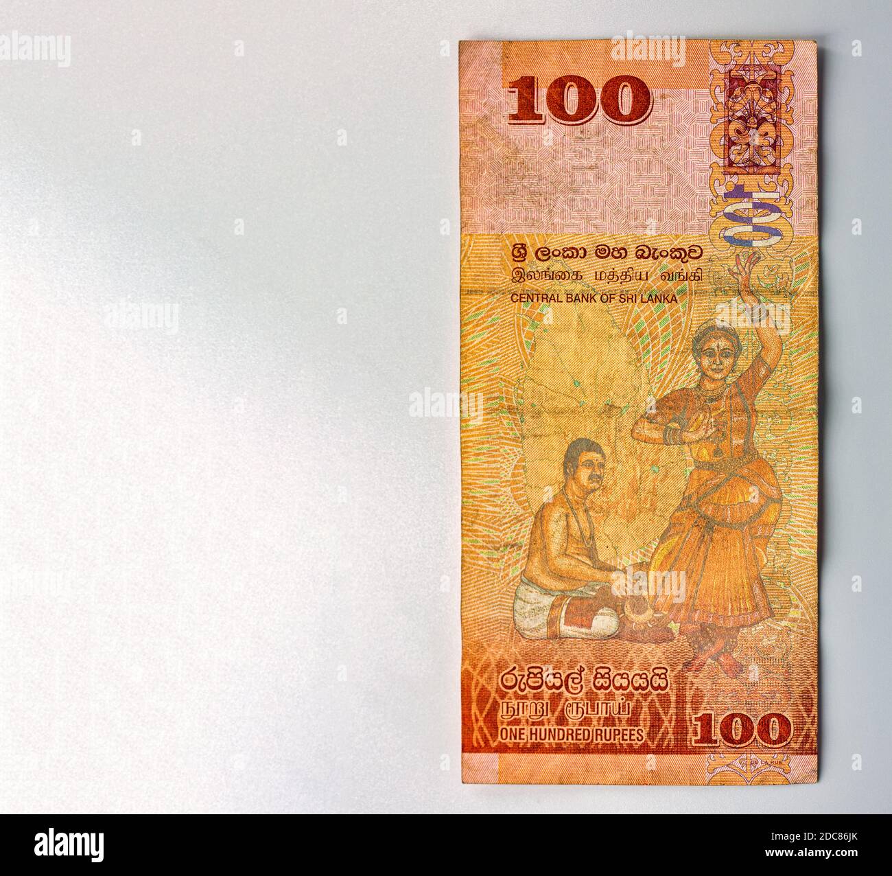 100 Sri Lankan rupee used bank note closeup on white background with ...