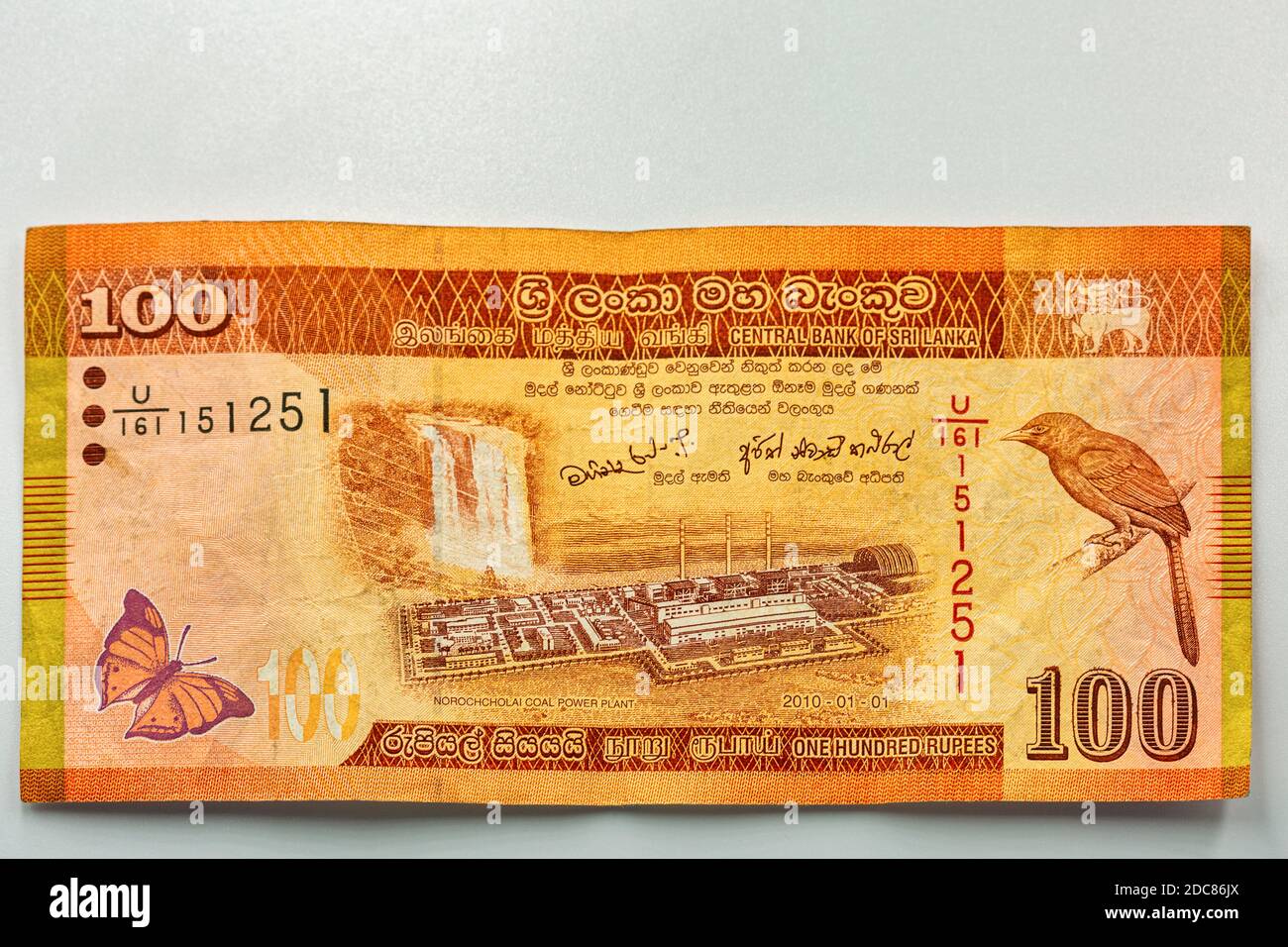 used 100 Sri Lankan rupee reverse used banknote closeup with copy space ...