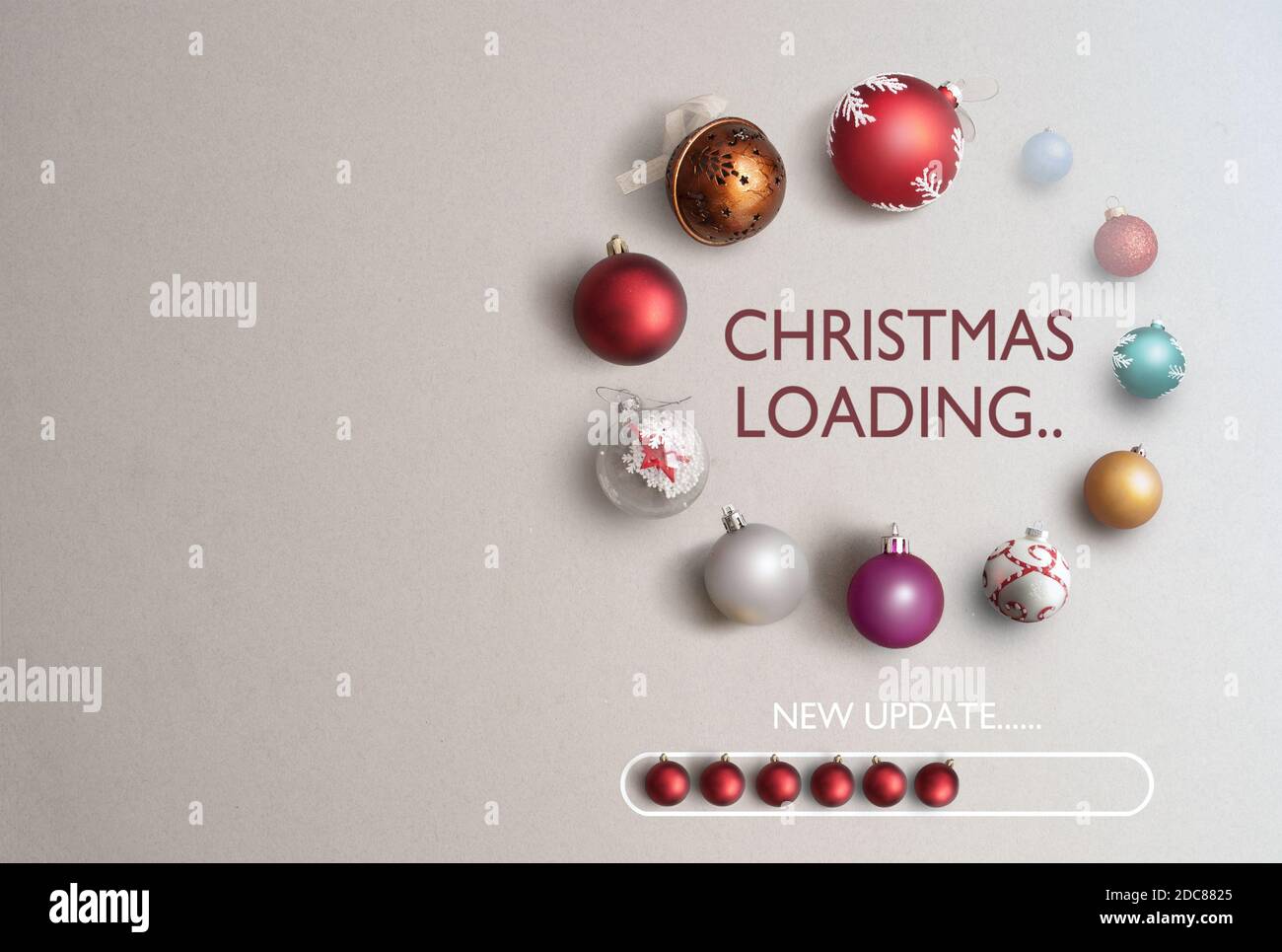 Baubles in the shape of a page loading icon with christmas loading ...