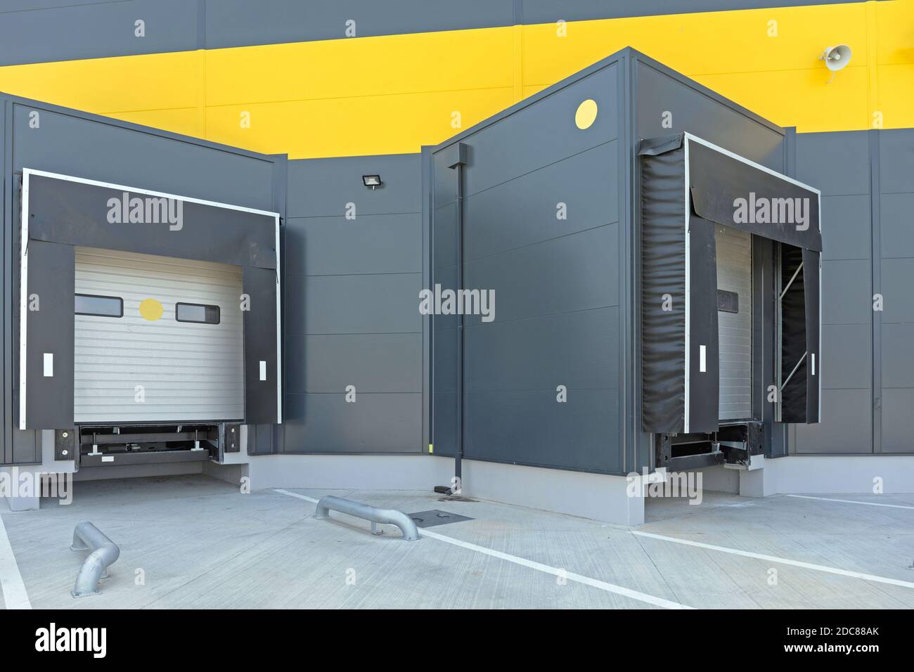 Loading Dock Cargo Doors at Distribution Warehouse Stock Photo - Alamy
