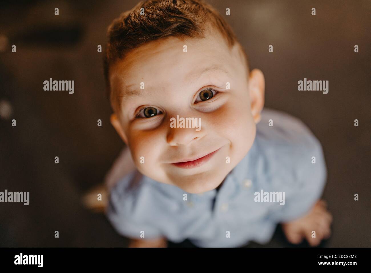 Portrait of joyful and smiling boy. Top view Stock Photo - Alamy