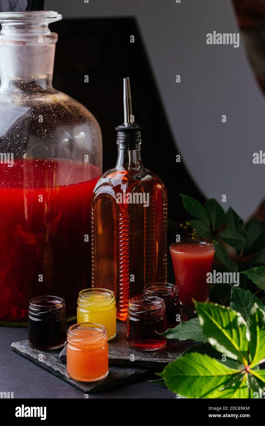 berry alcoholic tinctures in shorts Stock Photo - Alamy