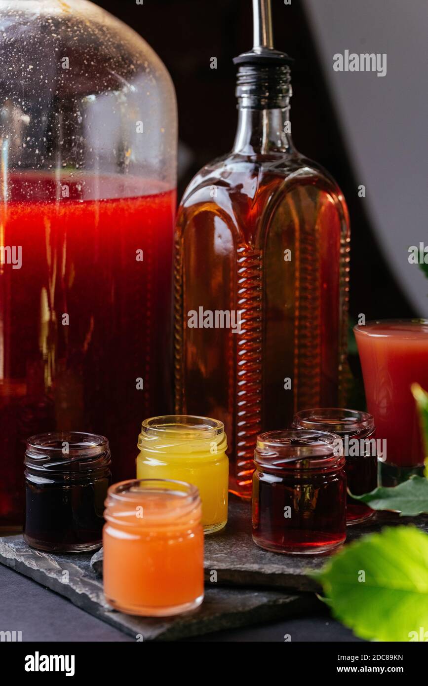 berry alcoholic tinctures in shorts Stock Photo - Alamy