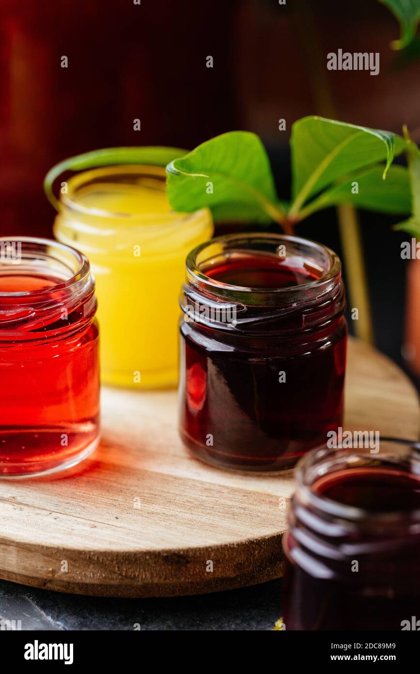 berry alcoholic tinctures in shorts Stock Photo - Alamy