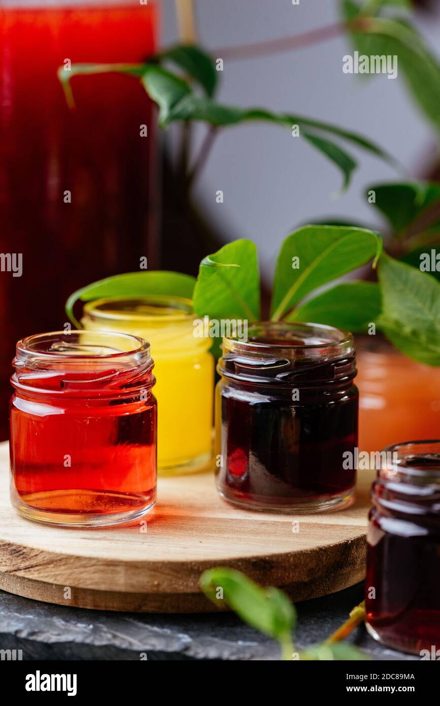 berry alcoholic tinctures in shorts Stock Photo - Alamy