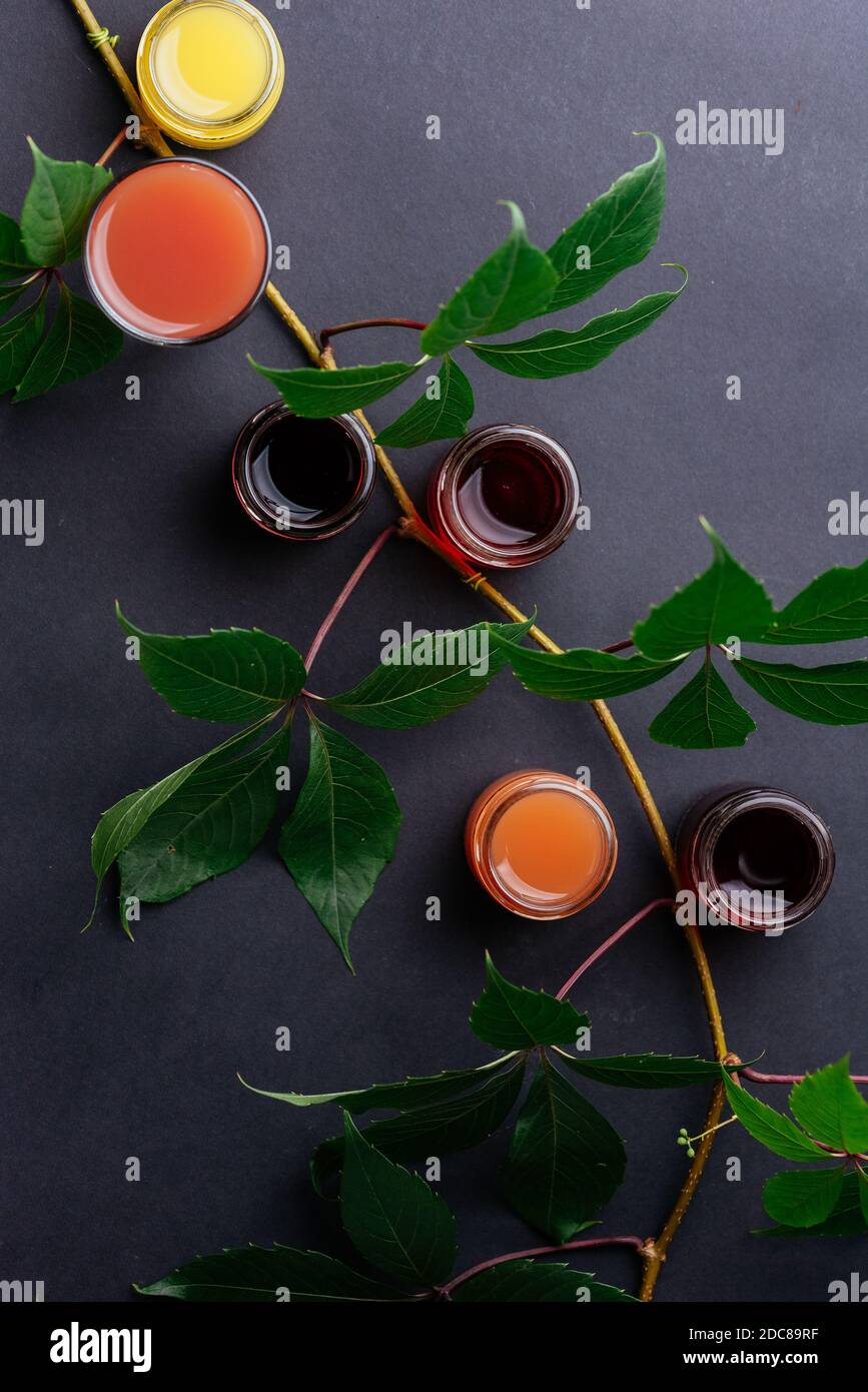 berry alcoholic tinctures in shorts Stock Photo - Alamy