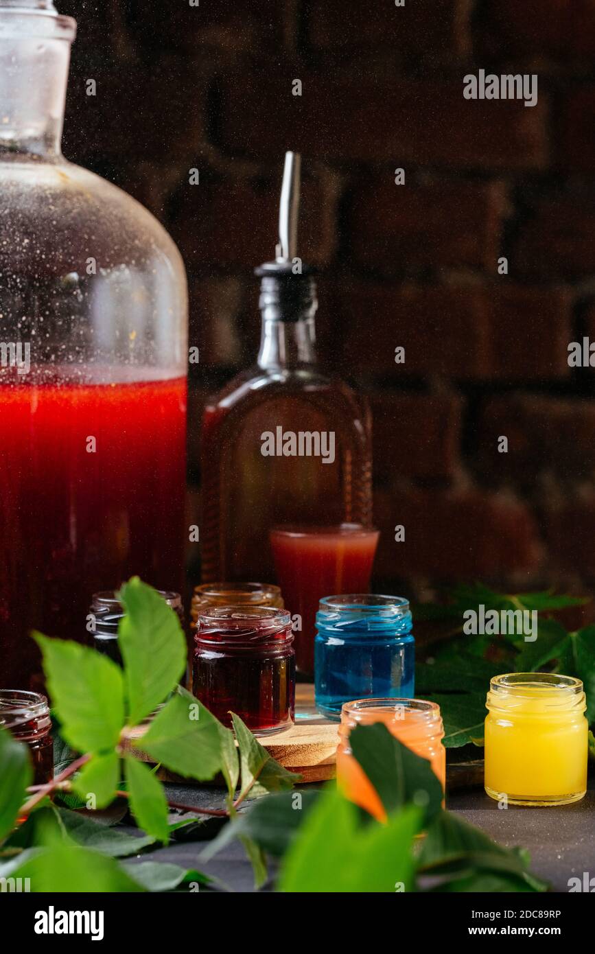 berry alcoholic tinctures in shorts Stock Photo - Alamy