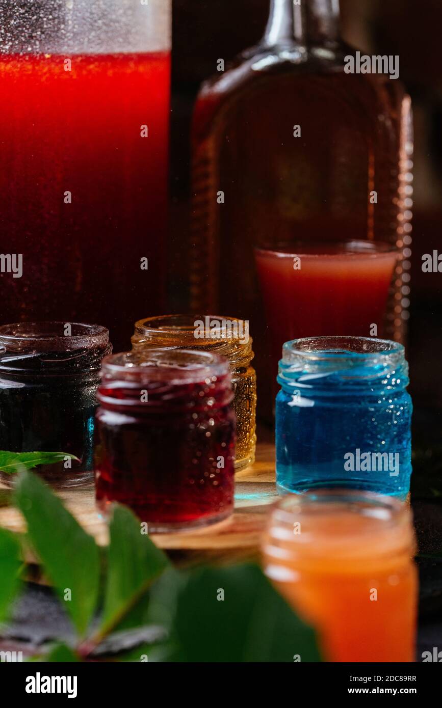 berry alcoholic tinctures in shorts Stock Photo - Alamy