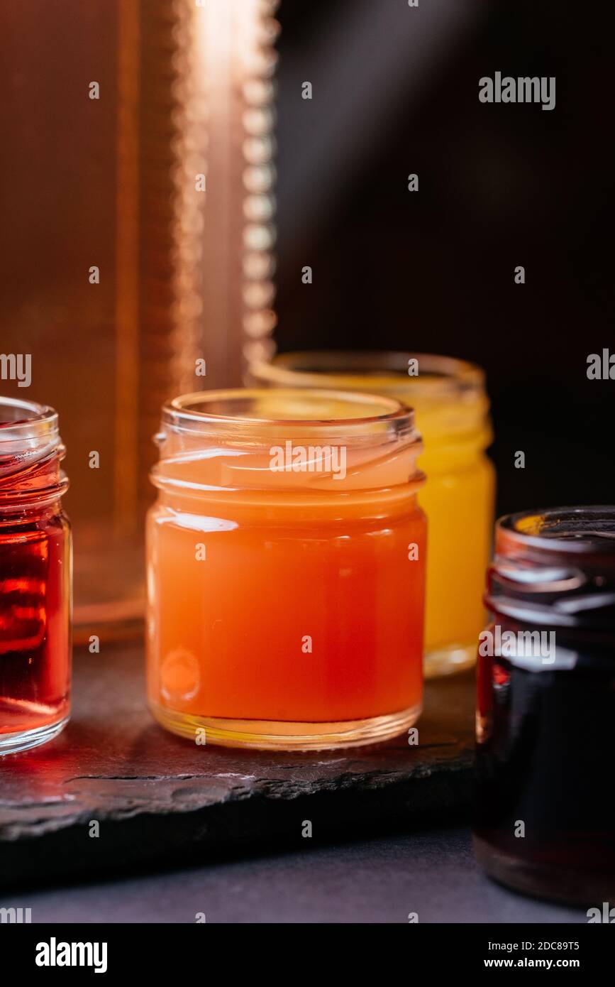 berry alcoholic tinctures in shorts Stock Photo - Alamy