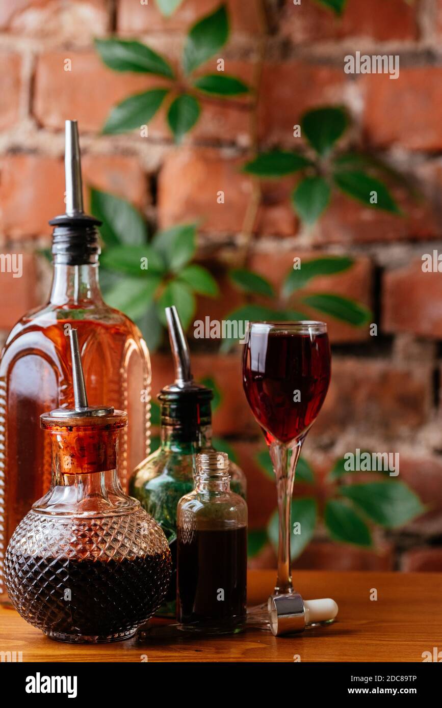 berry alcoholic tinctures in shorts Stock Photo - Alamy