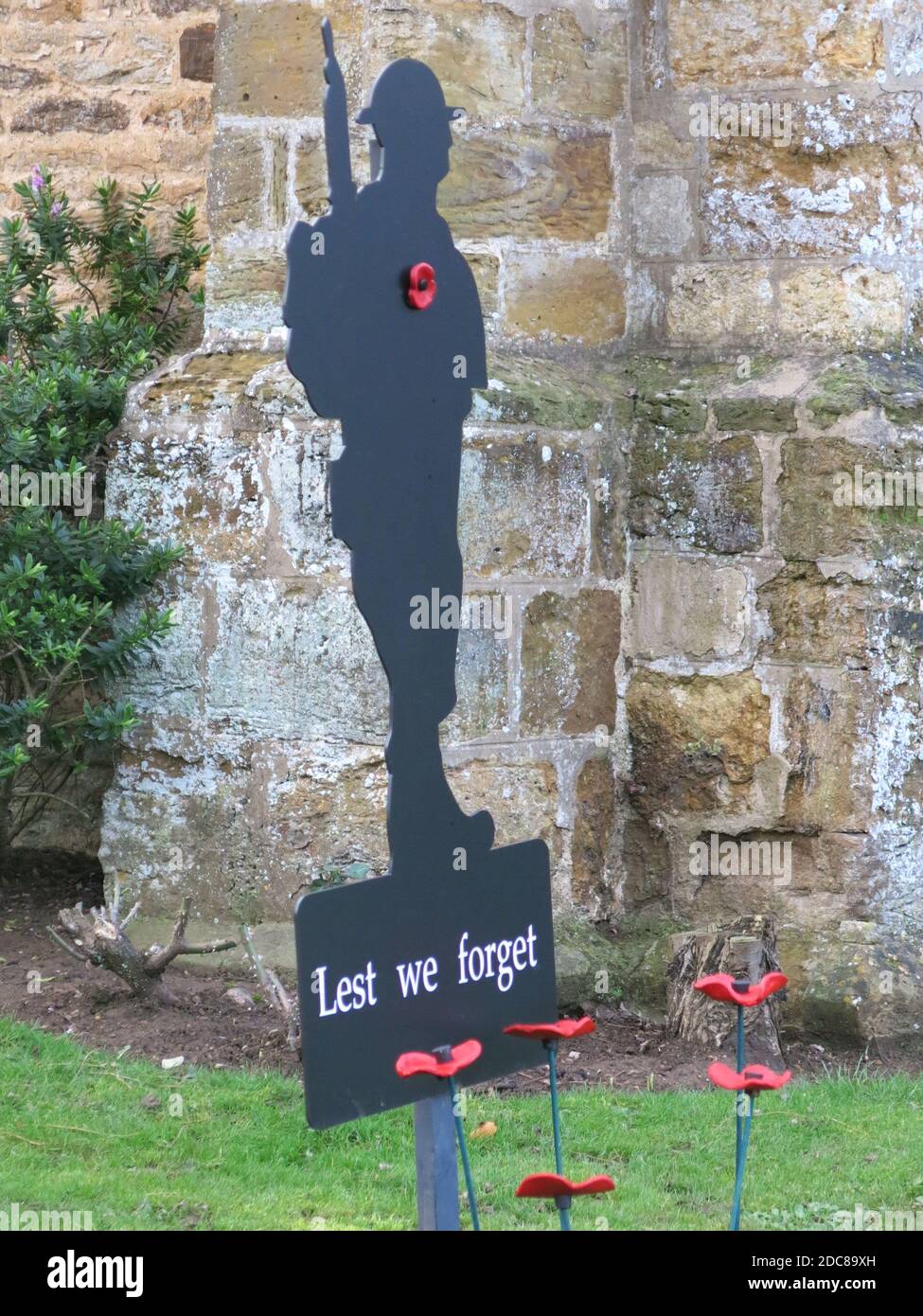 Remembrance poppy soldier silhouette hi-res stock photography and ...