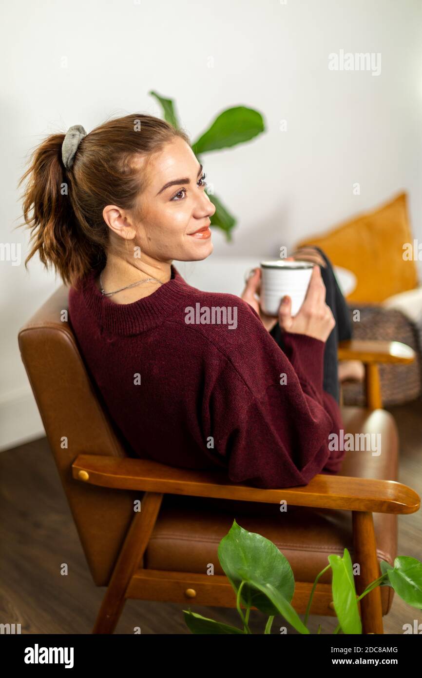 Sitting cozy hi-res stock photography and images - Alamy