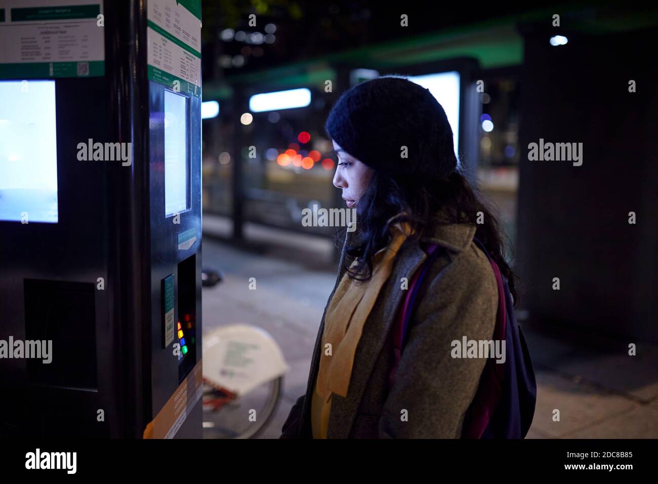 woman Using ATM at night Stock Photo - Alamy