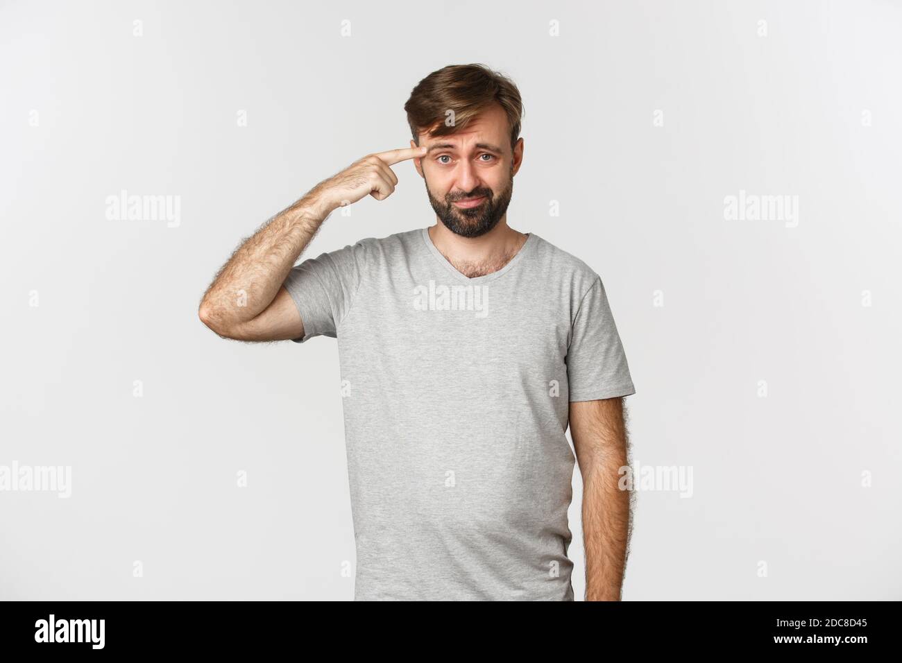 Portrait of frustrated guy scolding someone for being crazy or strange ...