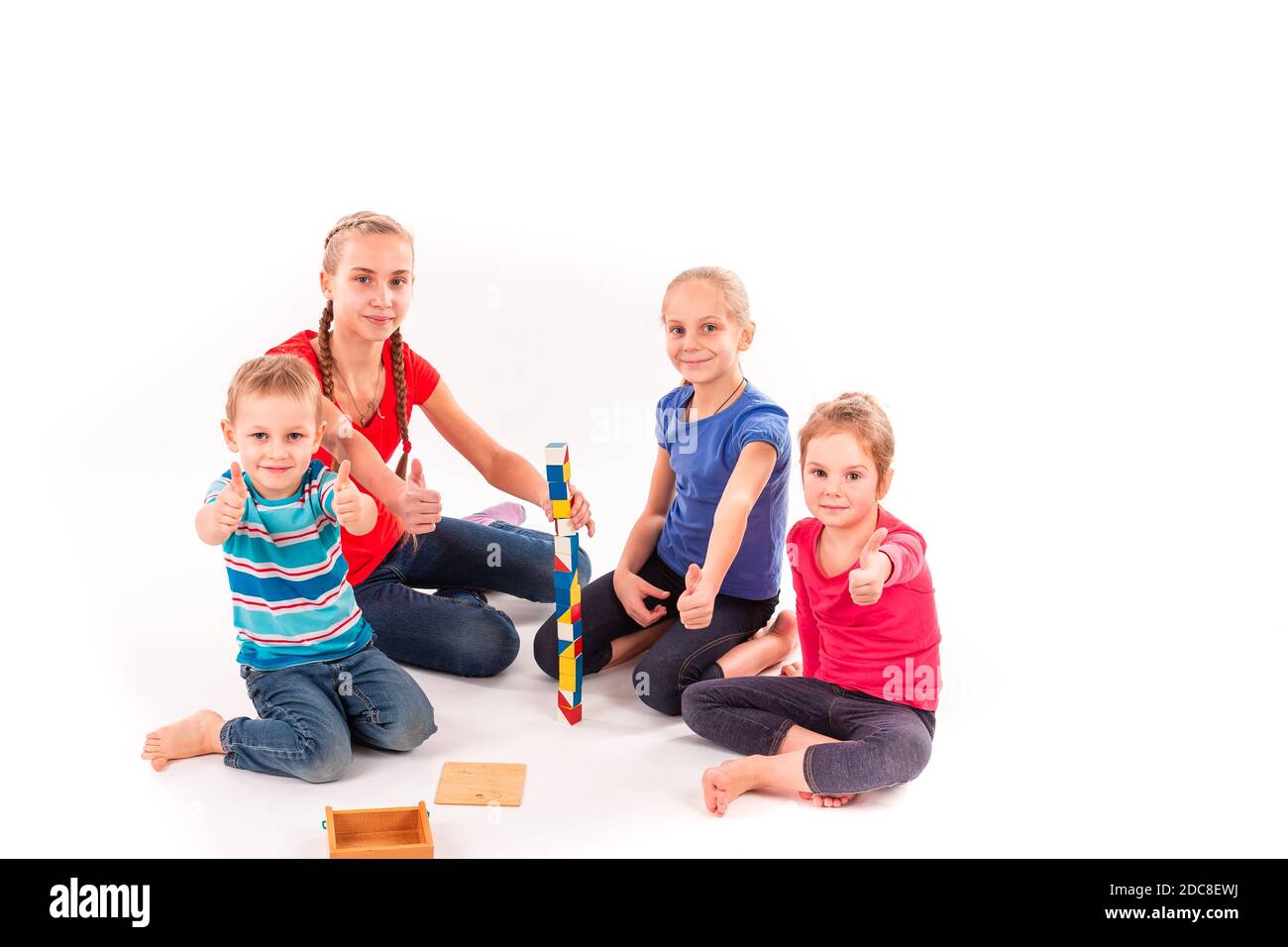 Indian girl sitting on house Cut Out Stock Images & Pictures - Alamy