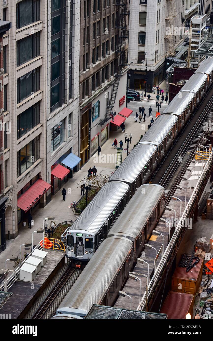 Urban city commuter train tracks among skyscrapers Stock Photo - Alamy