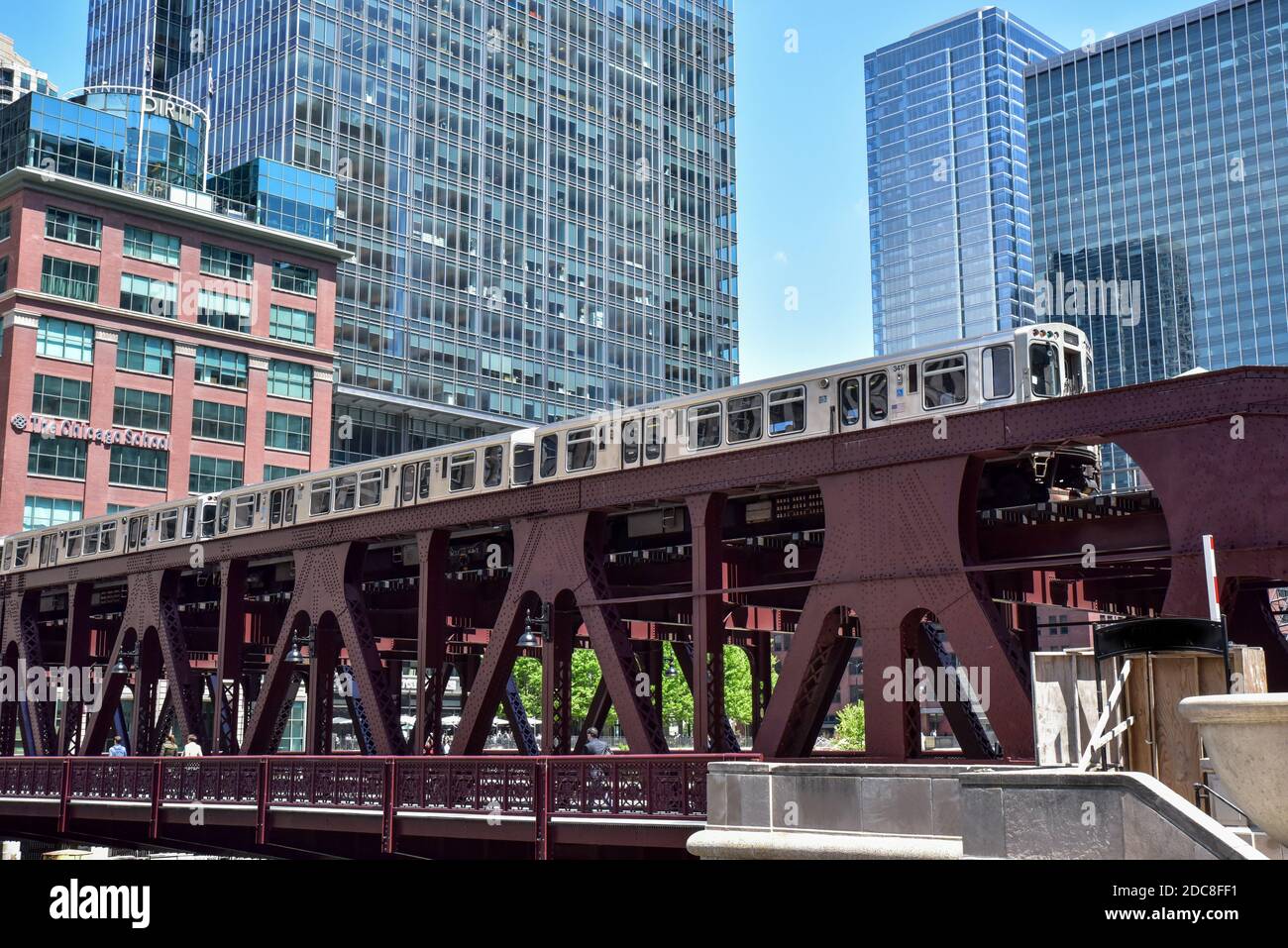 Urban city commuter train tracks among skyscrapers Stock Photo - Alamy