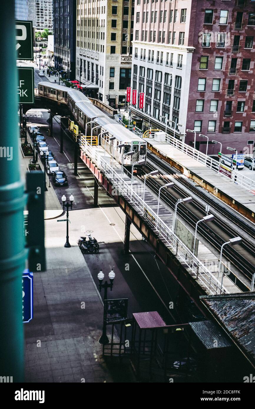 Urban city commuter train tracks among skyscrapers Stock Photo - Alamy