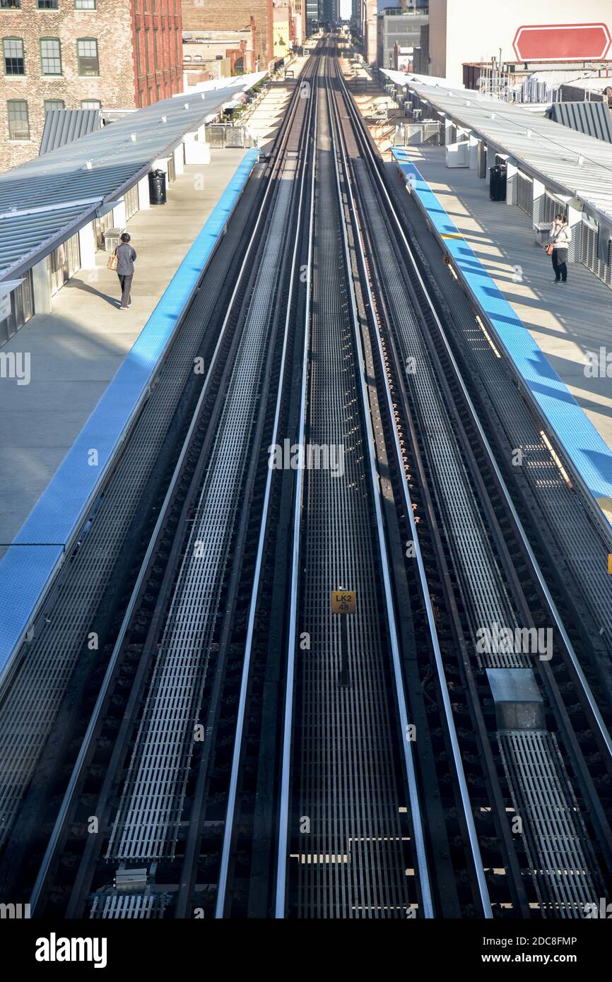 Urban city commuter train tracks among skyscrapers Stock Photo - Alamy
