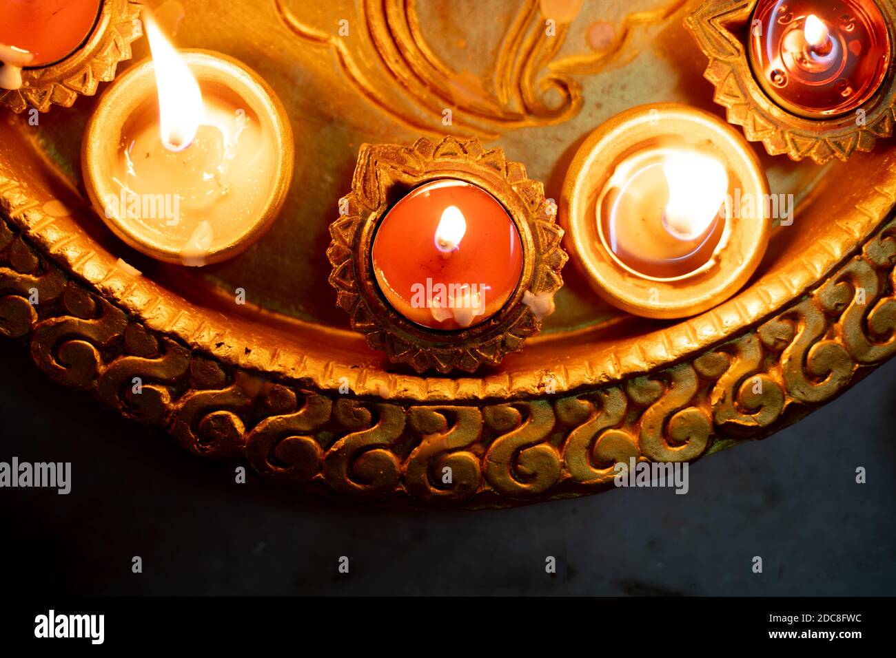 Gold diya hi-res stock photography and images - Alamy