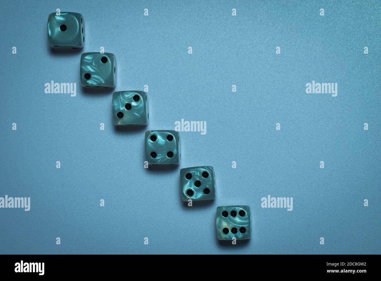 six dice indicate numbers from one to six on a light background Stock ...