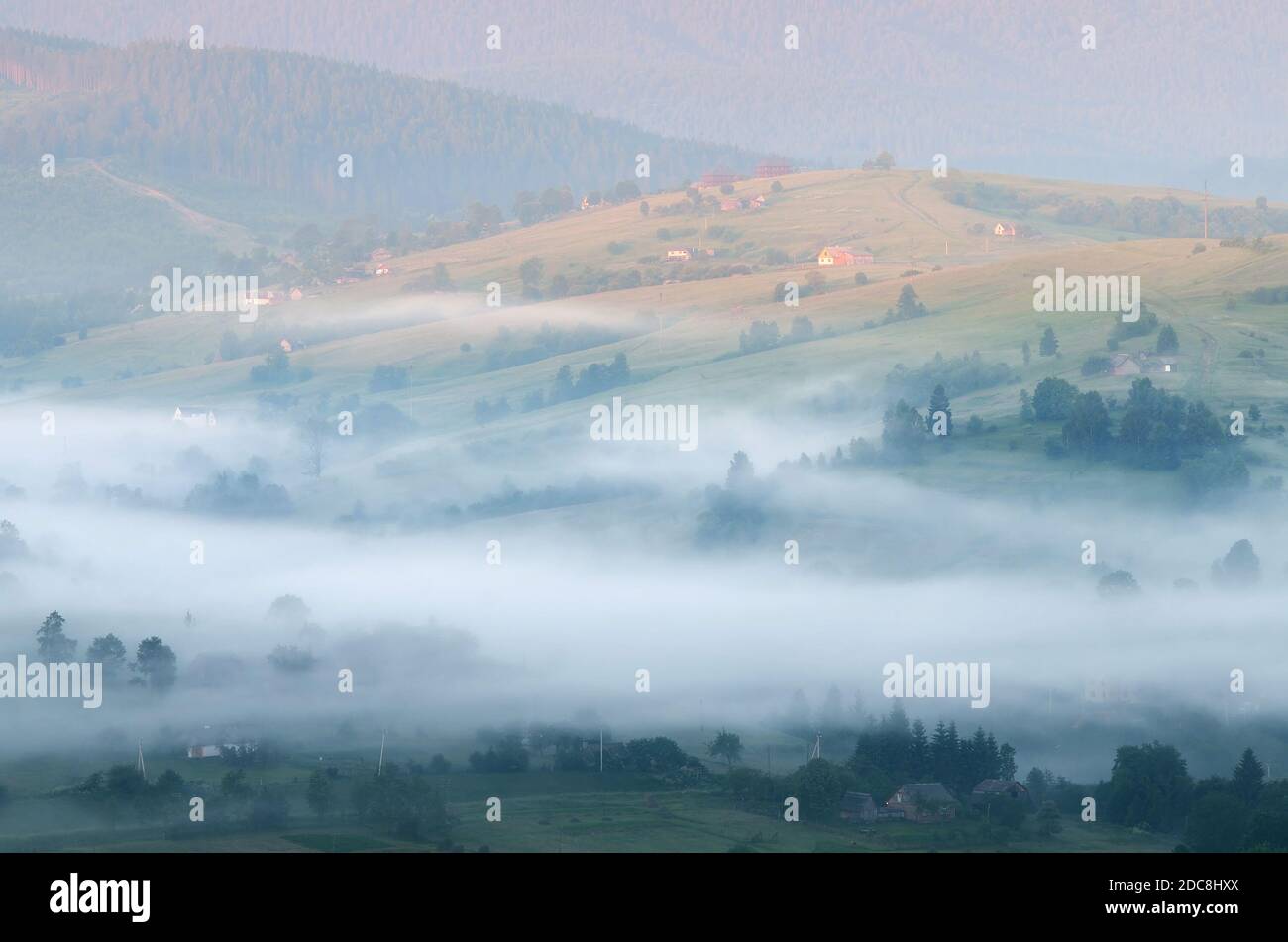 Fog light over village hi-res stock photography and images - Alamy