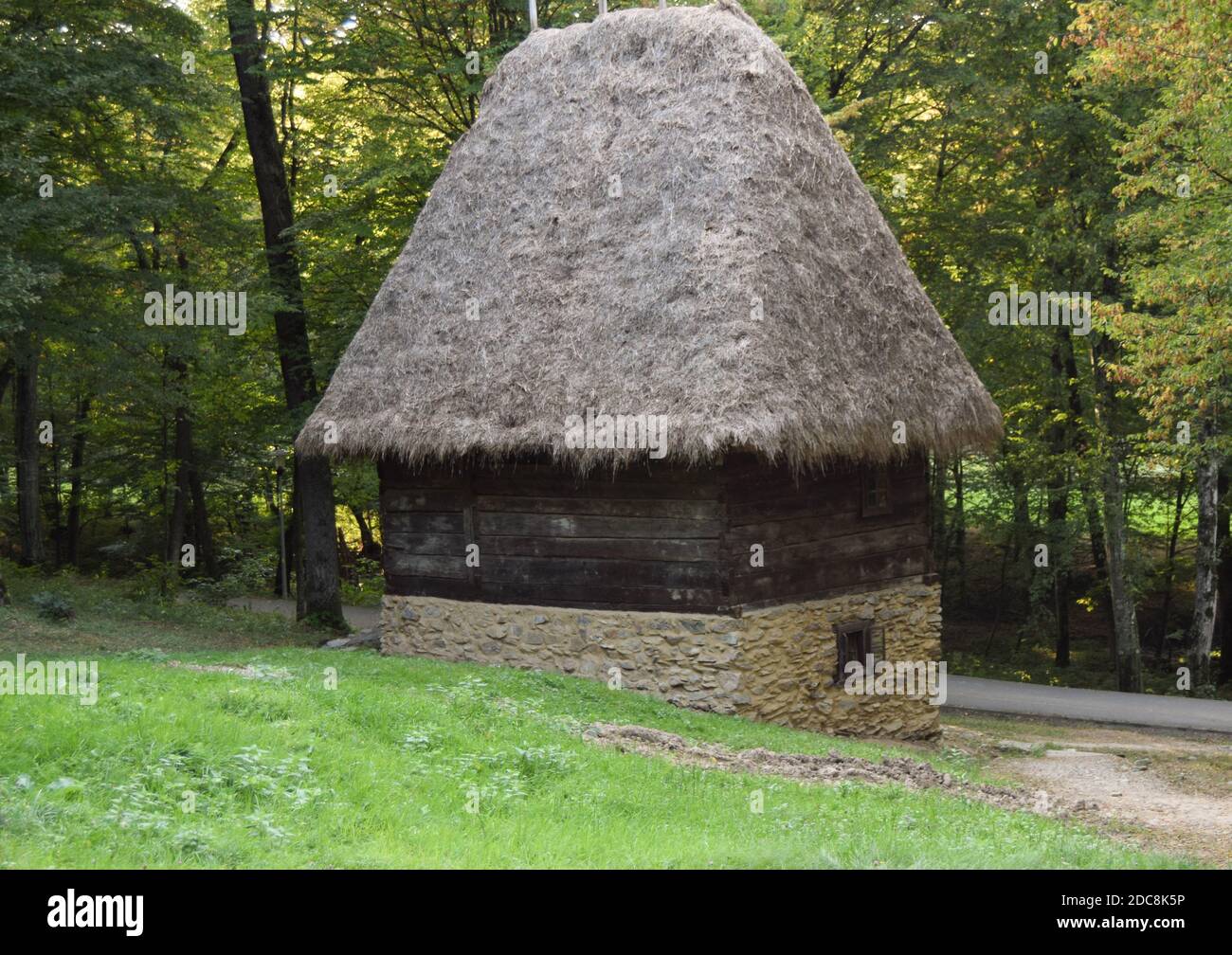 Old wooden rustic idyllic houses of Romanian folk culture. Old ...