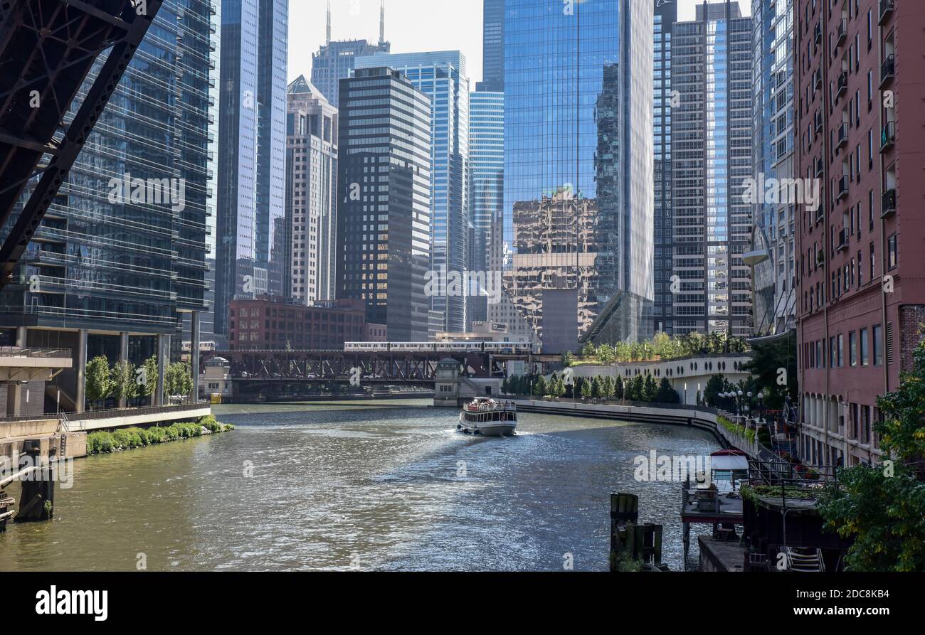 Chicago River running through the big city among skyscrapers and blue ...