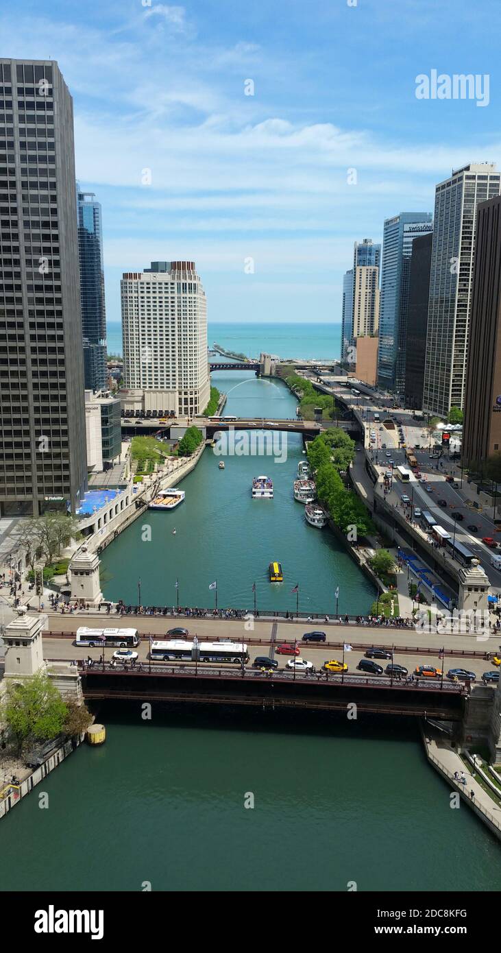 Chicago River running through the big city among skyscrapers and blue ...