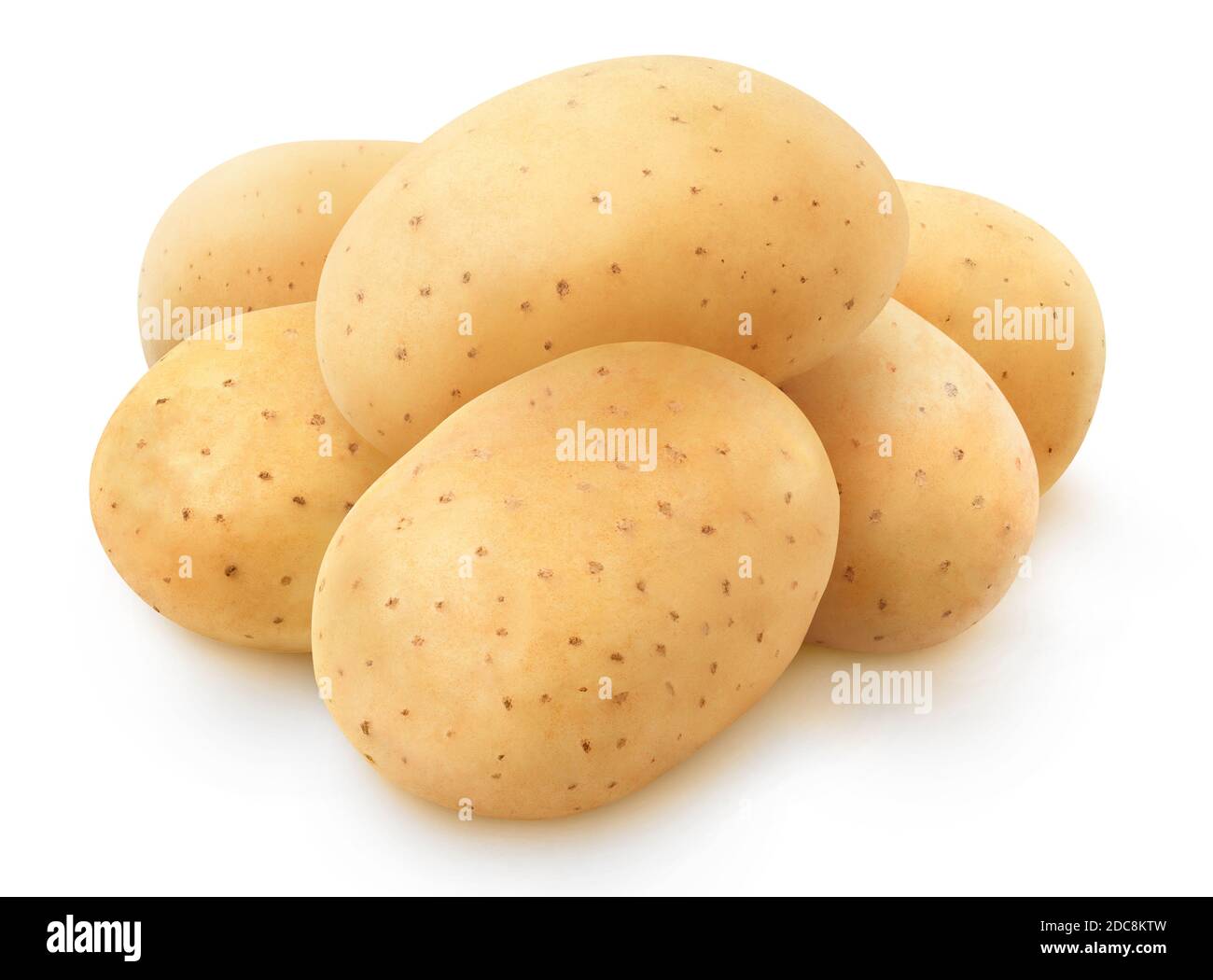 Washed potatoes in a pile isolated on white background Stock Photo - Alamy