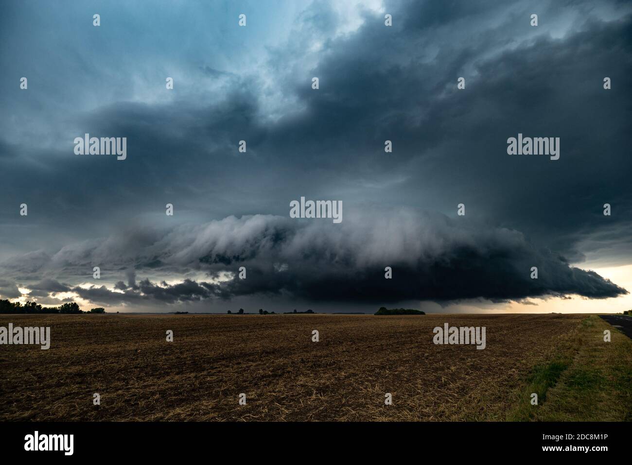 Rotating wall cloud of a supercell thunderstorm over the plains Stock ...