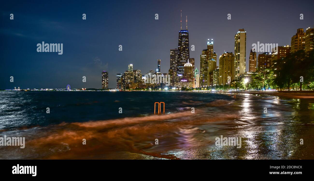 Chicago city skyline lights at night Stock Photo - Alamy
