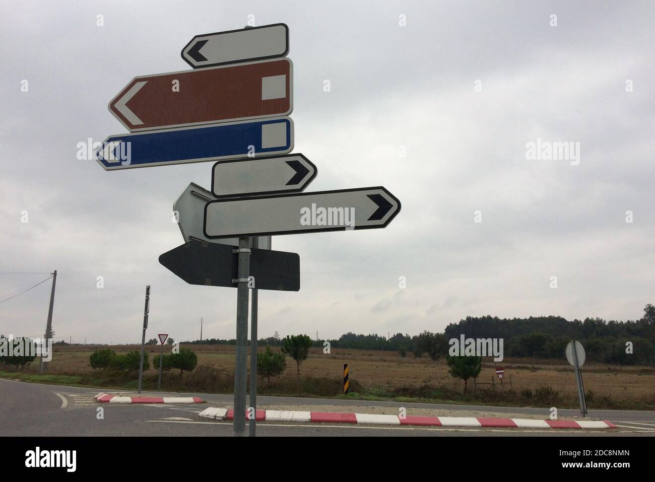 traffic signs showing in different directions Stock Photo - Alamy