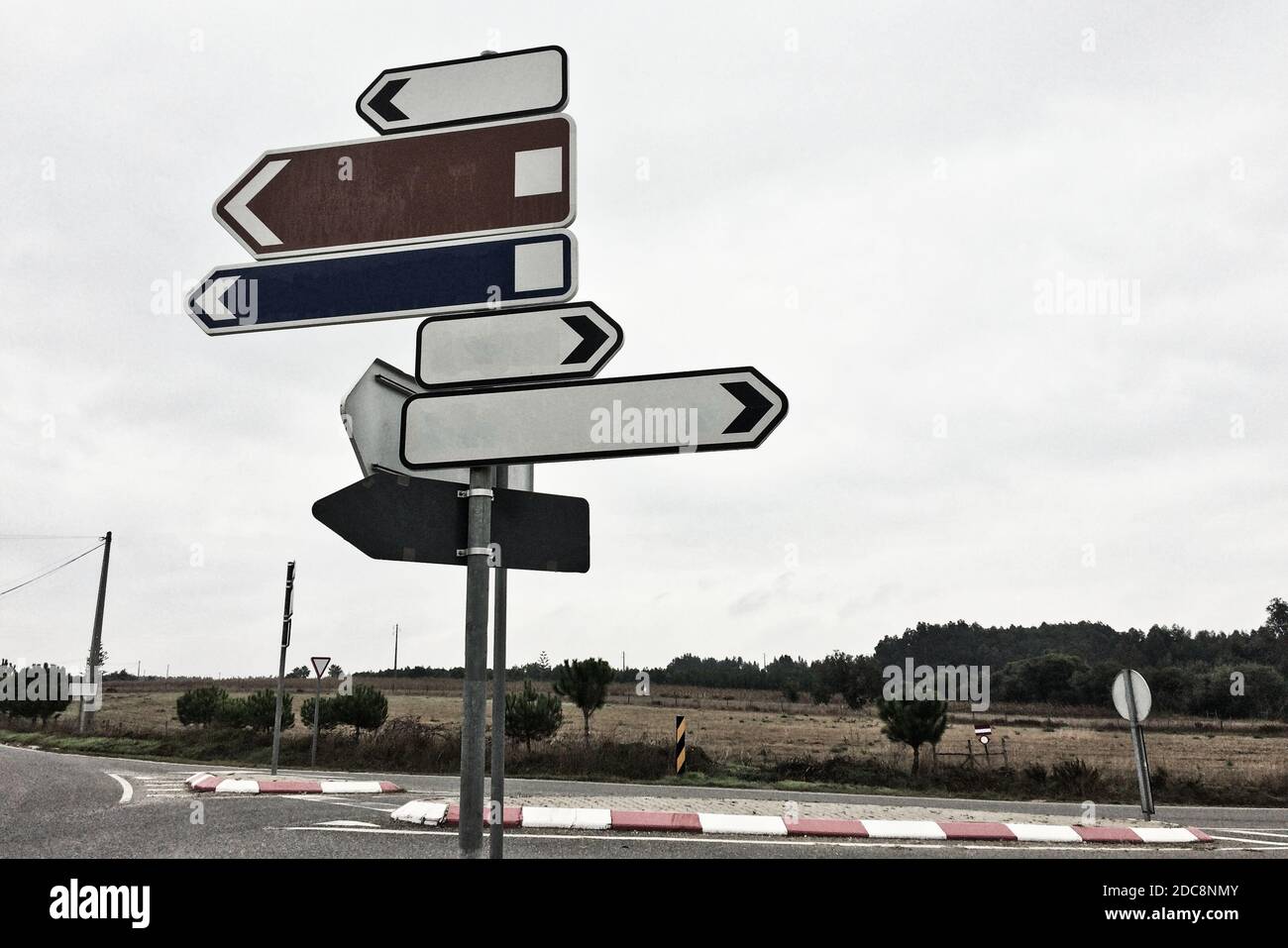 traffic signs showing in different directions, lot of ways, variability ...