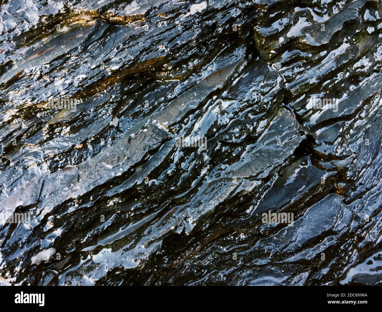 wet rock, stone formations as a background Stock Photo - Alamy