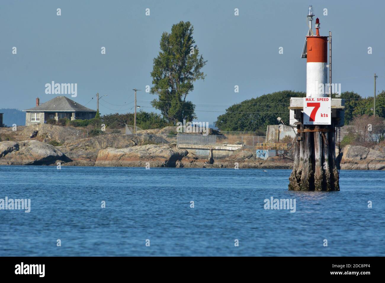 Buoy marker along the shore in the ocean harbor Stock Photo - Alamy