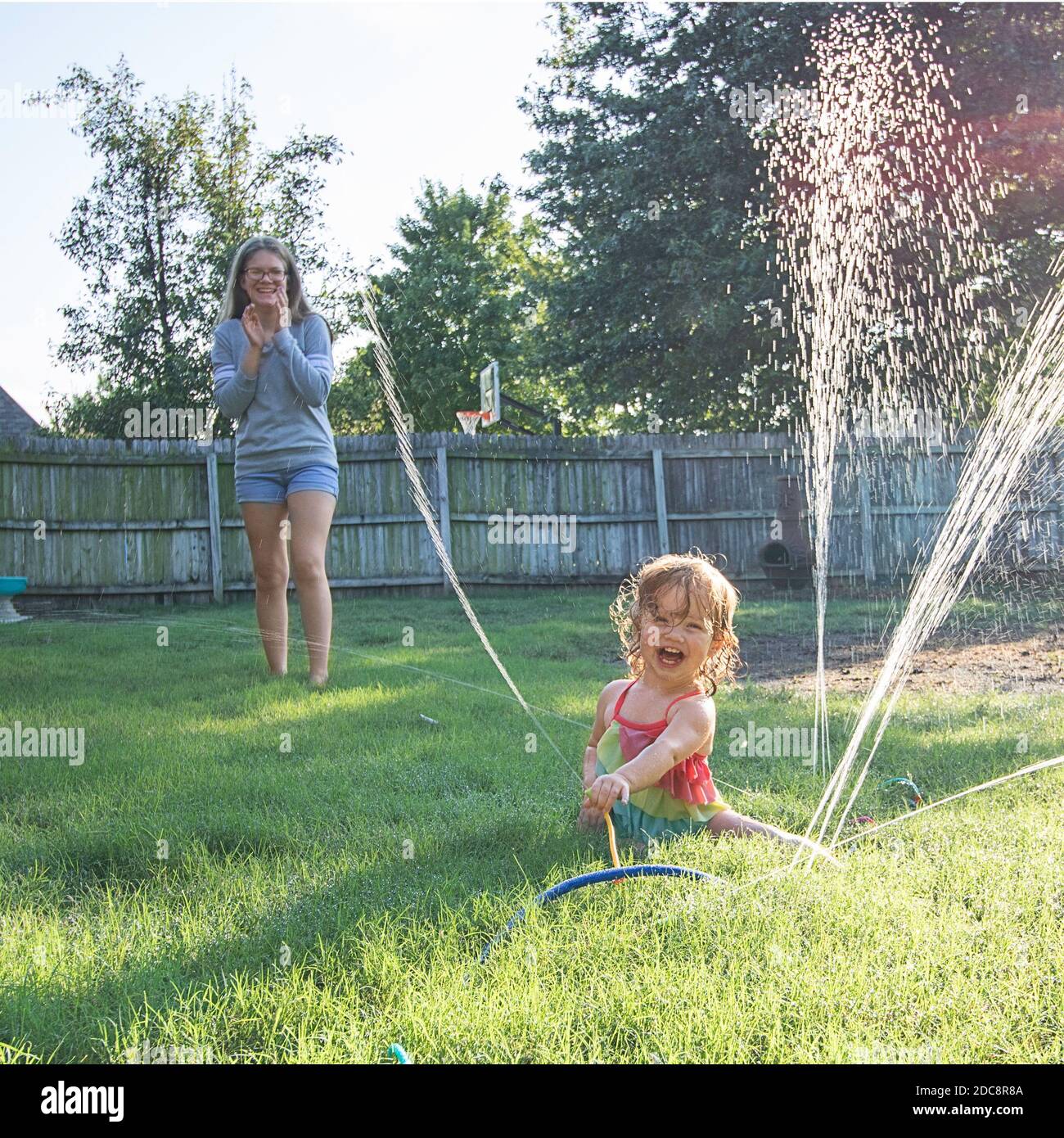Sprinklers summer fun hi-res stock photography and images - Alamy