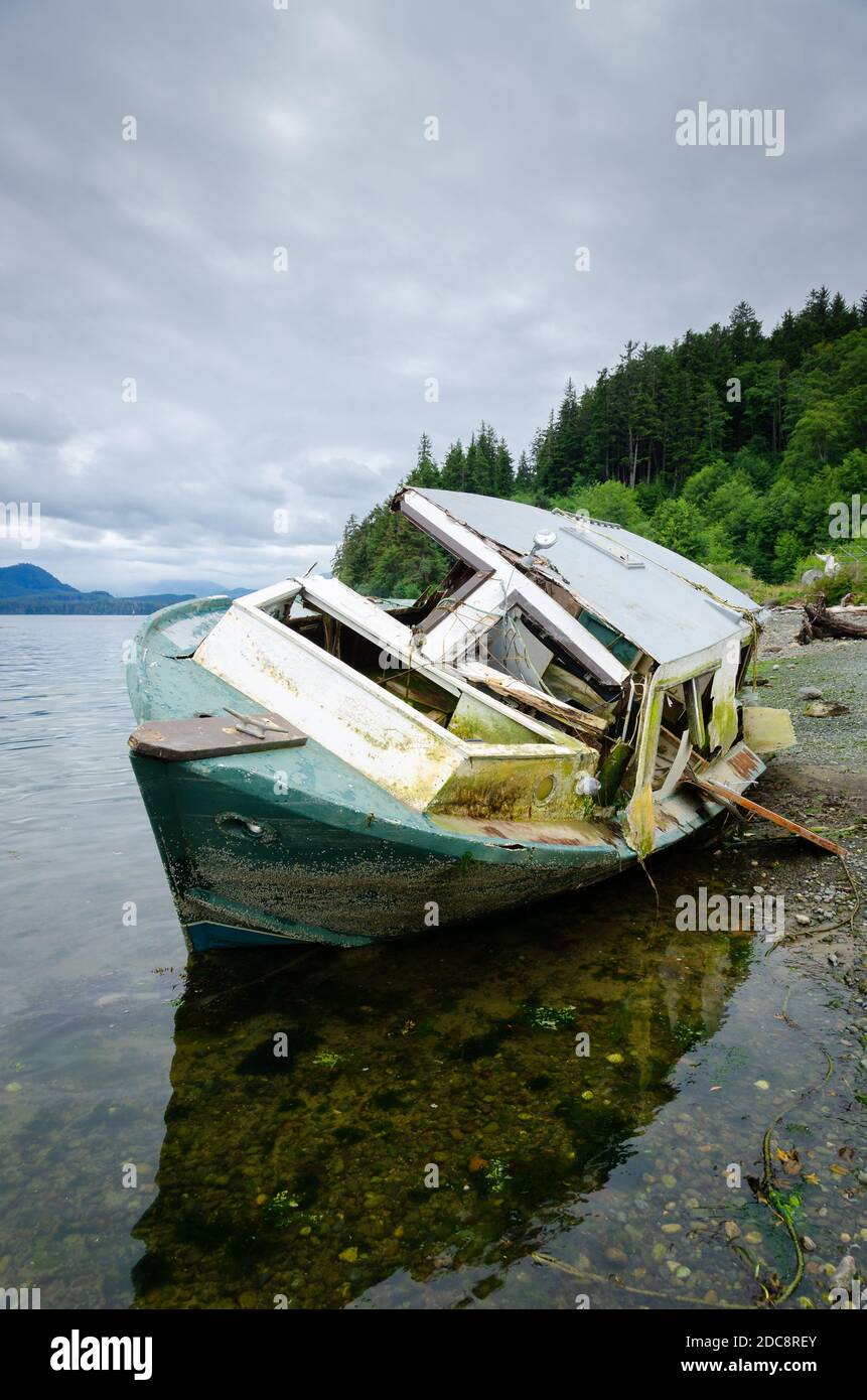 Fishing boat wreck on beach Stock Photo - Alamy
