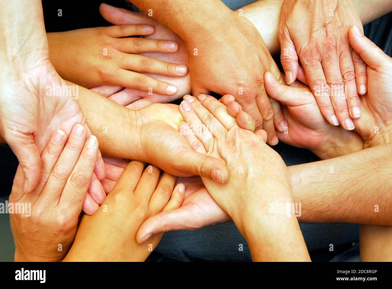 reaching and touching hands, non verbal communication and symbol for ...