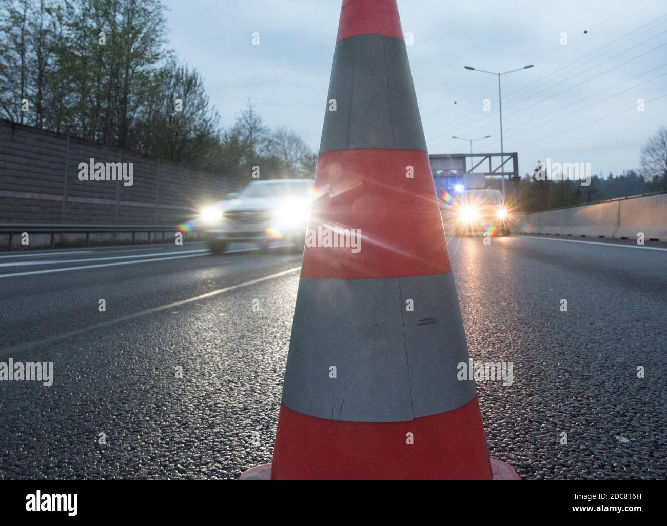 pylons as detour or redirection on a freeway, road sign on a highway ...