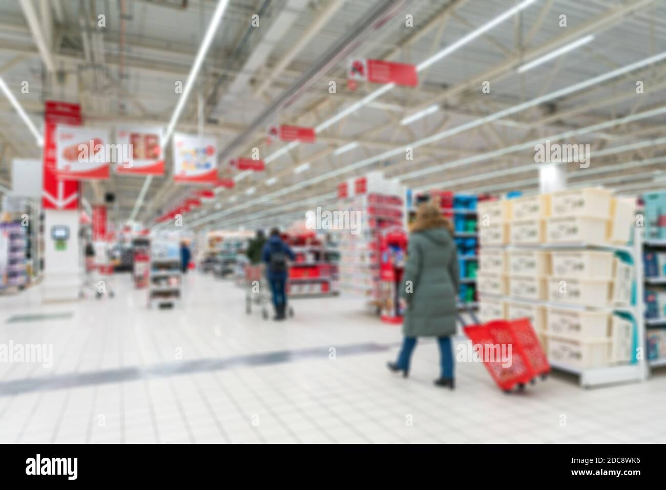 Blurred supermarket. Selling goods in a retail store. Blurred ...