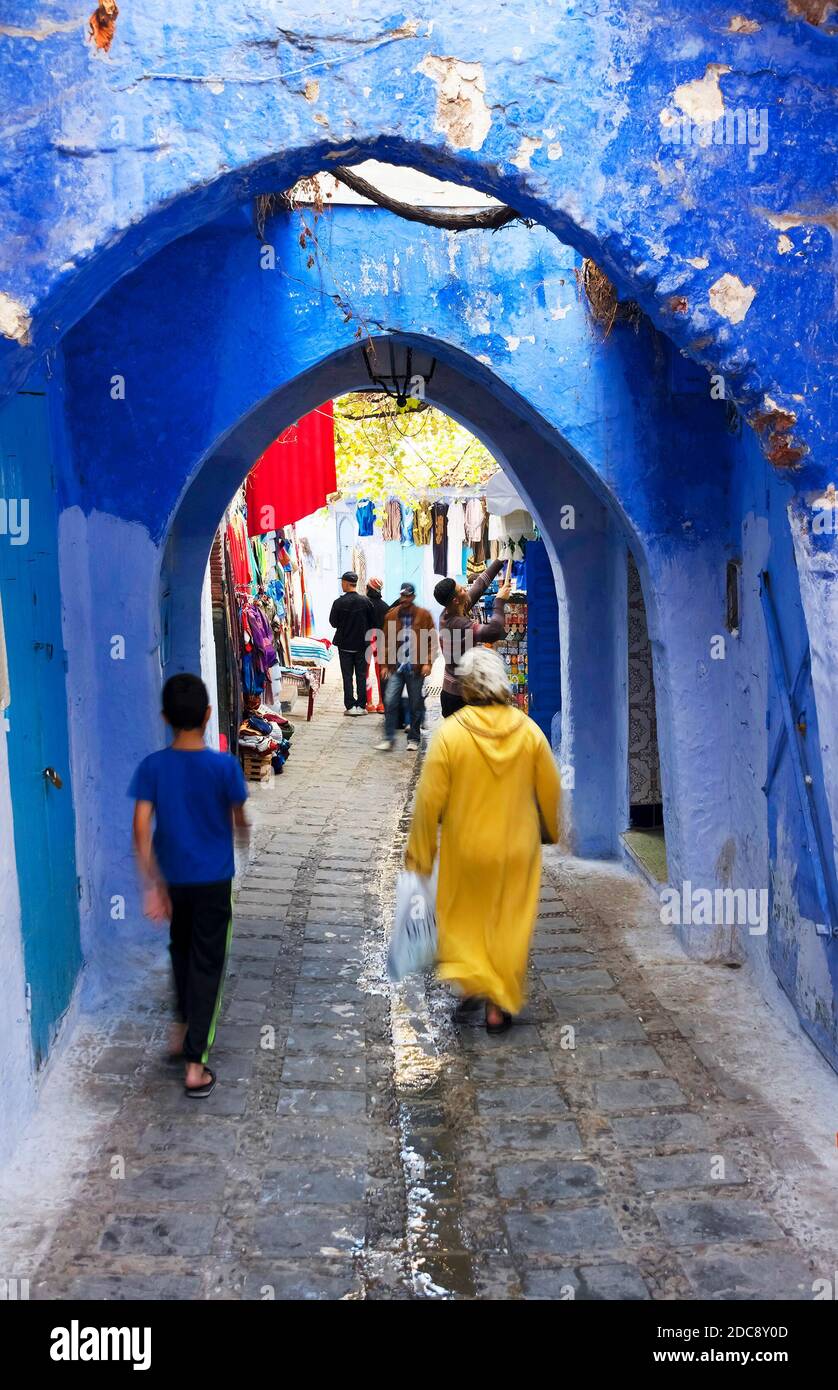 Street life in the Blue city of Chefchaouen, one of the tourist ...